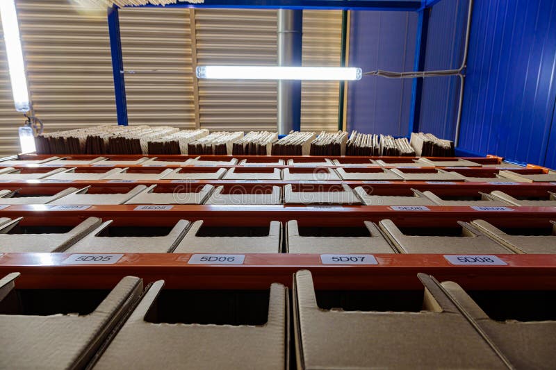 Boxes on Racks in a Warehouse of Goods Close-up. Stock Photo - Image of ...
