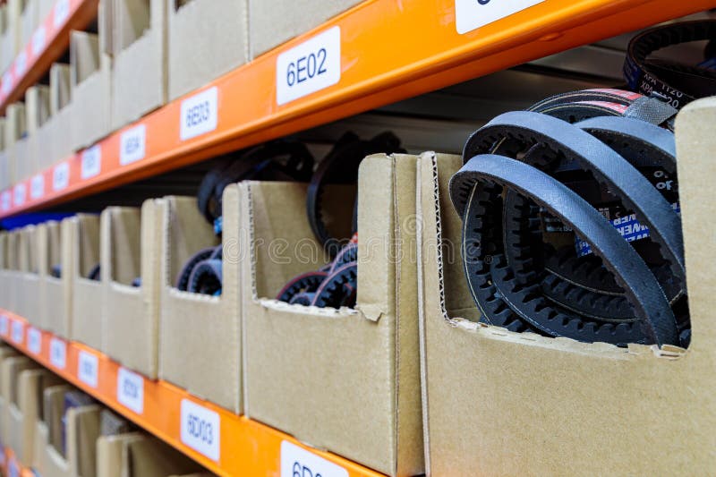Boxes on Racks in a Warehouse of Goods Close-up. Stock Image - Image of ...
