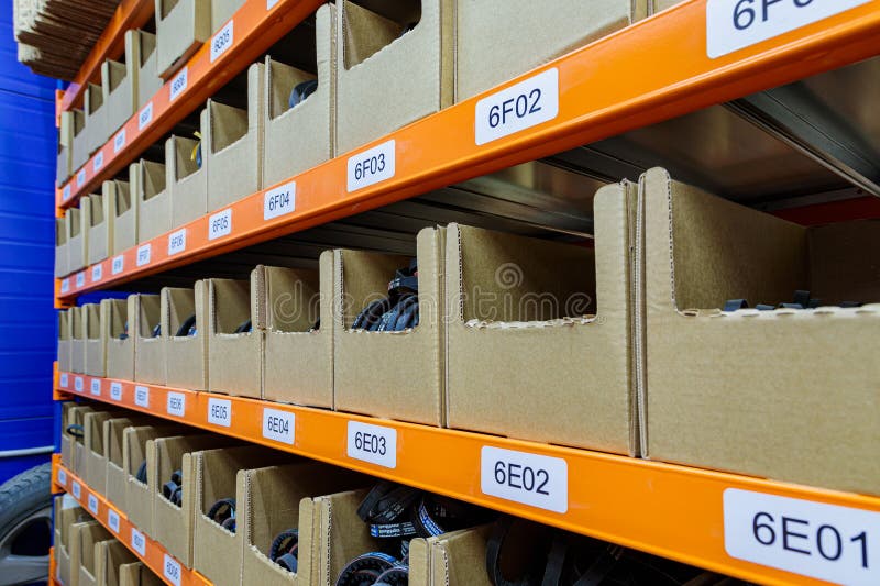 Boxes on Racks in a Warehouse of Goods Close-up. Stock Image - Image of ...