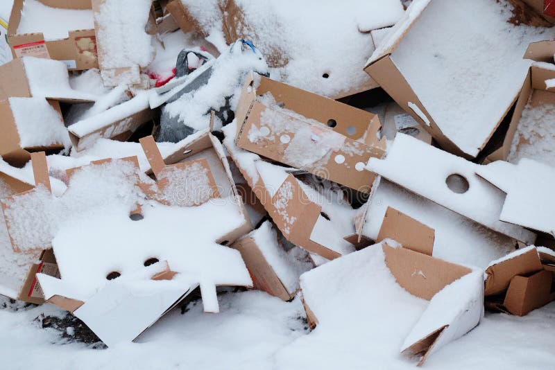 Boxes in the snow stock photo. Image of dumping, orange - 108776612