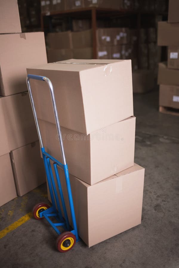 Boxes on Trolley in Warehouse Stock Image - Image of room, trolley ...