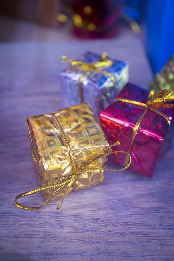 Boxes Wrapped with Shiny Gift Wrap Stock Image - Image of ribbon ...