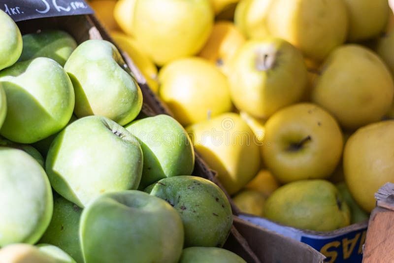 Boxes with Yellow and Green Apples on a Store Counter on a Sunny Day ...
