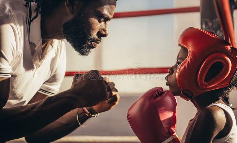 Boxing Trainer Teaching a Kid about Boxing Stock Image - Image of young ...