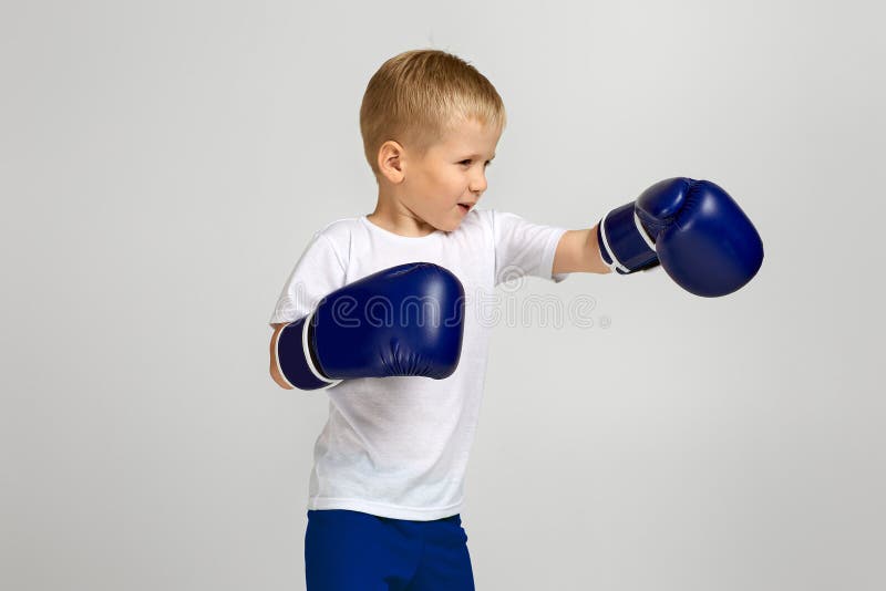 Little Boy Boxing, Shows His Fists, Isolated on White Stock Photo ...