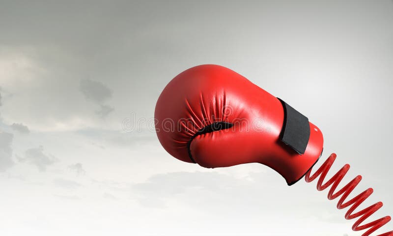 Red boxing glove on spring stock image. Image of punch - 79151251
