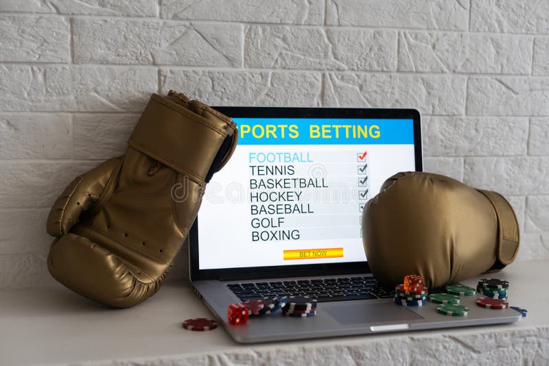 Boxing Gloves and a Laptop with Sports Bets Editorial Photography ...