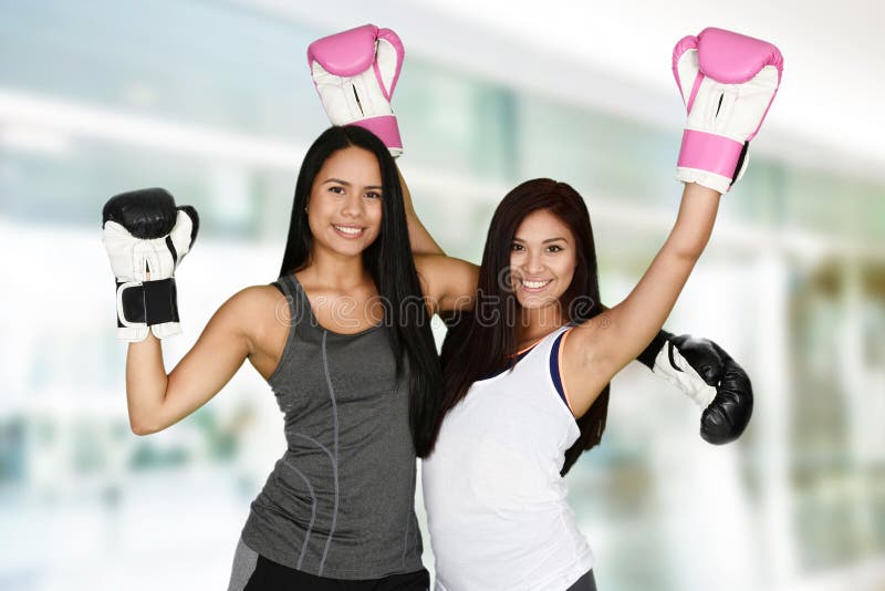 Over the Shoulder View of Two Female Boxers Boxing in the Boxing Ring ...