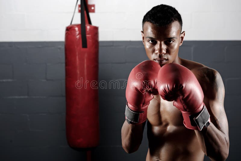 Young Man Looking Aggressive with Boxing Gloves. Caucasian Male Stock ...