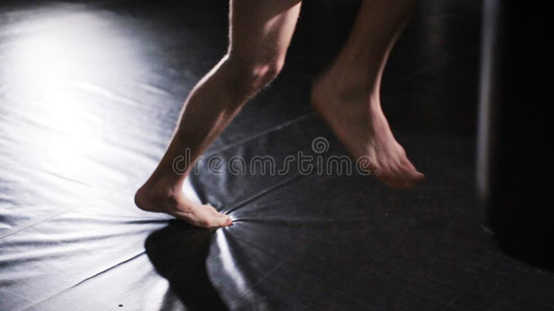 Boxing Rack and Boxer`s Legs Movement. Slow Motion Stock Footage ...