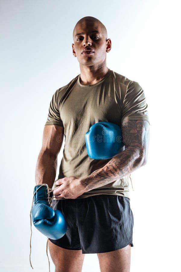 Man Wearing Boxing Gloves Standing in a Boxing Pose Stock Photo - Image ...