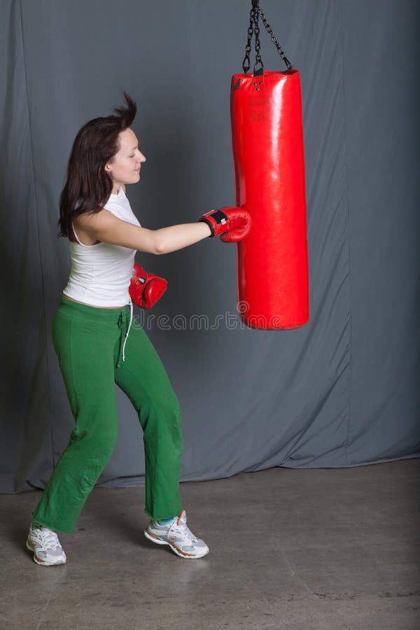 Boxing Training Woman with Punching Bag in Gym Stock Photo - Image of ...
