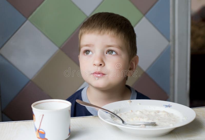 Boy dinner stock image. Image of hand, breakfast, juice - 17993605