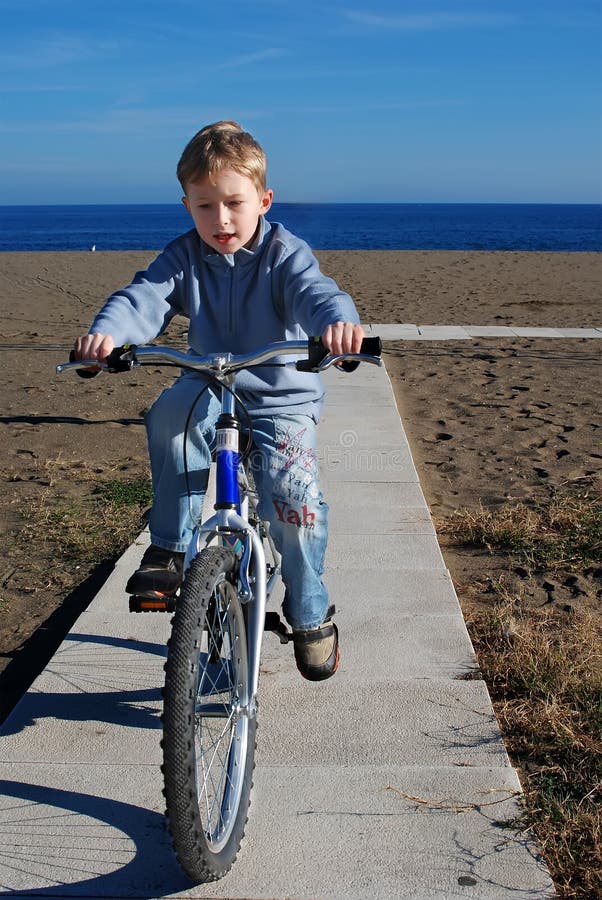 Boy stock image. Image of bike, color, cute, light, holiday - 5418477