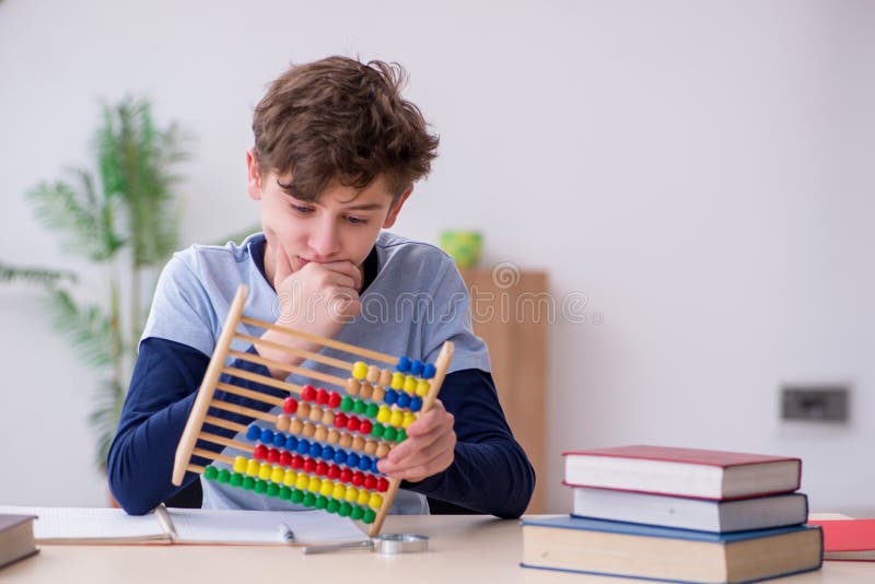 Schoolboy with Abacus Studying Math at Home Stock Image - Image of ...