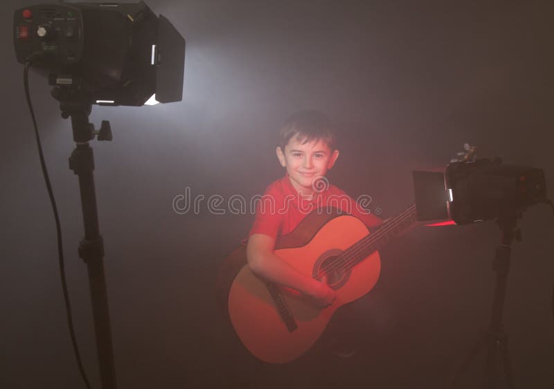 Boy with Acoustic Guitar in Fog Stock Photo - Image of instrument ...