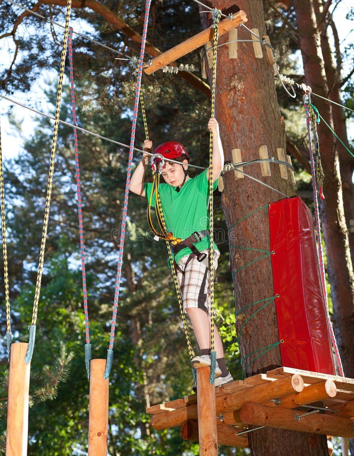 Boy in adventure park stock photo. Image of empowerment - 16190014