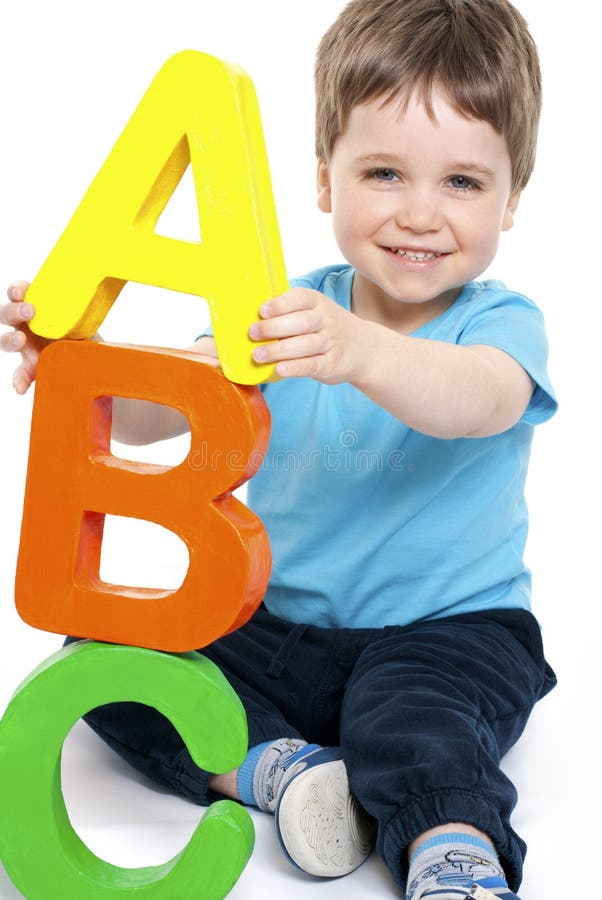 Boy holding pencil stock photo. Image of infant, happy - 24518550