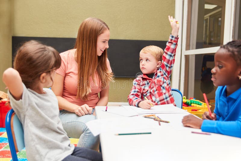 Teacher Answers To All The Questions Of The Pupils Stock Image - Image ...