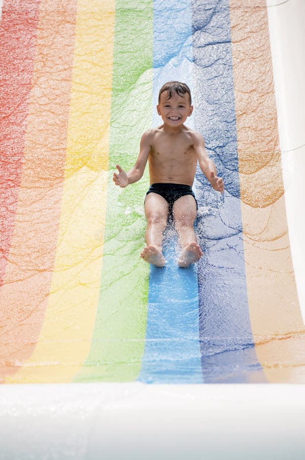 Boy at aqua park stock photo. Image of leisure, flume - 29315914