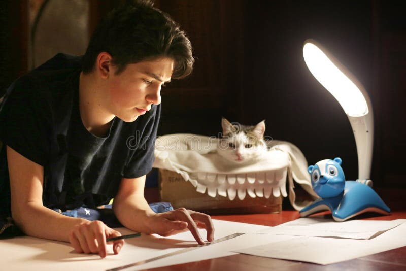 Boy Architect Student Working on Drafting Project in Night with Cat in ...