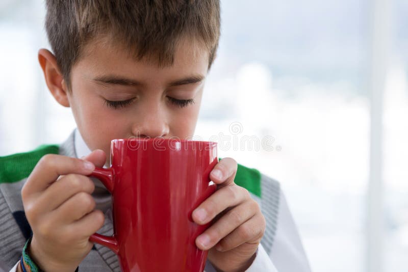 Boy As Business Executive Drinking Coffee Stock Photo - Image of ...
