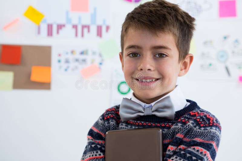 Boy As Business Executive Smiling in Office Stock Photo - Image of ...