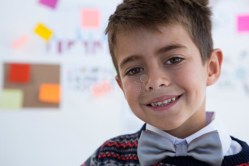 Boy As Business Executive Smiling in Office Stock Photo - Image of head ...