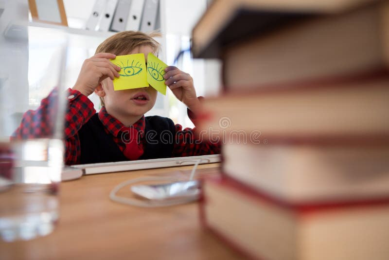 Boy As Business Executive with Sticky Notes on His Eyes Stock Image ...