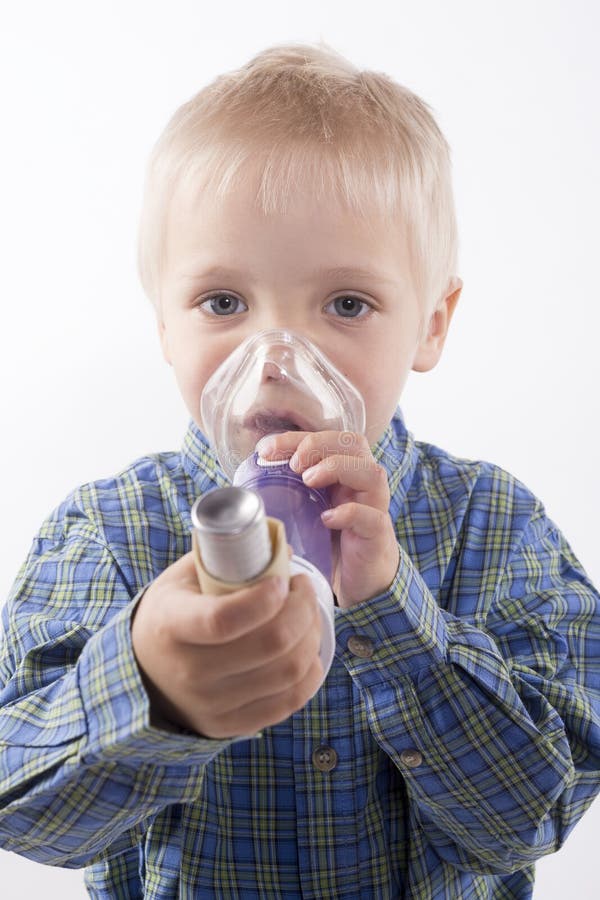 Boy with asthma inhaler stock image. Image of breathe - 90574719