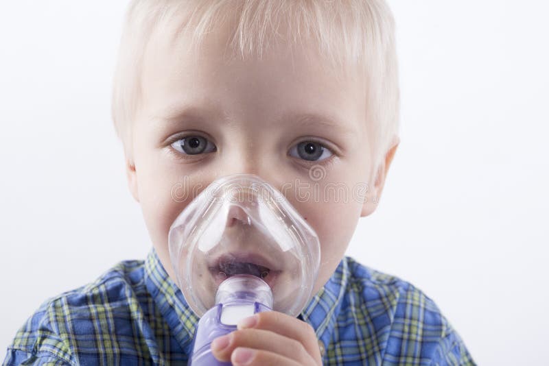 Boy with asthma inhaler stock image. Image of breathe - 90574719