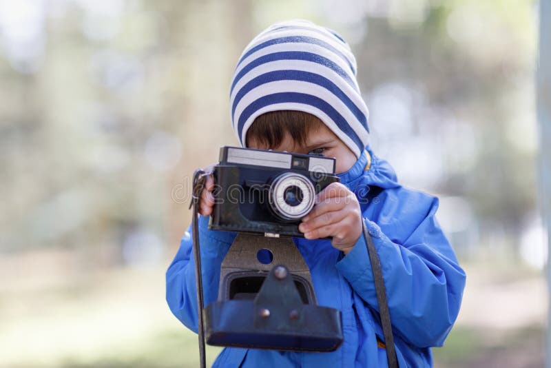 Boy with camera stock photo. Image of european, holding - 119727922