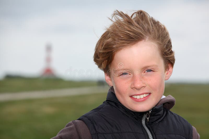 Boy in the autumn wind stock image. Image of outside - 20432791
