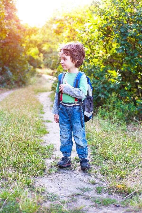 A boy with a backpack. stock image. Image of nature, beautiful - 99609823