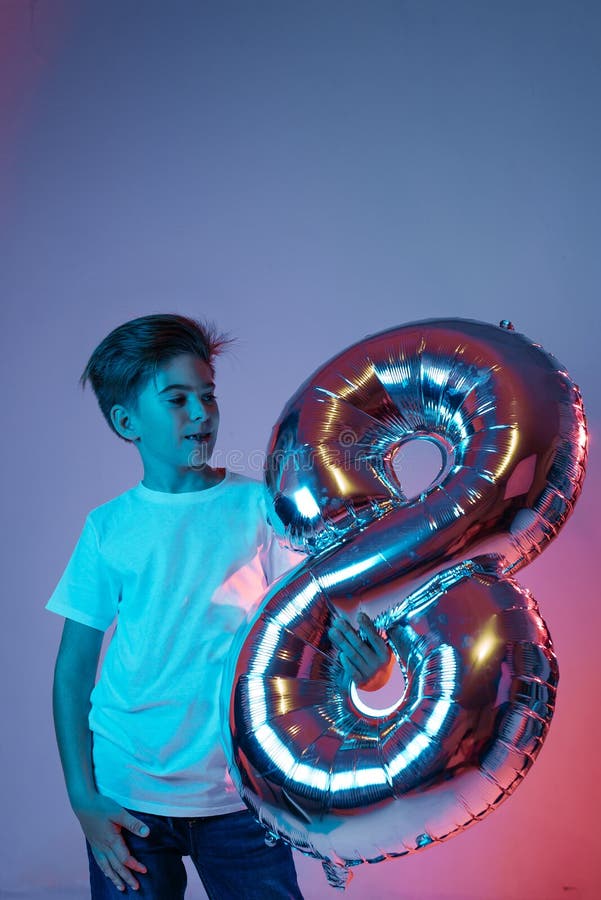 Boy with a Balloon in the Form of the Number Eight Stock Image - Image ...
