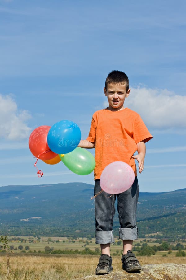 Boy with balloons stock photo. Image of colorful, beautiful - 14192154
