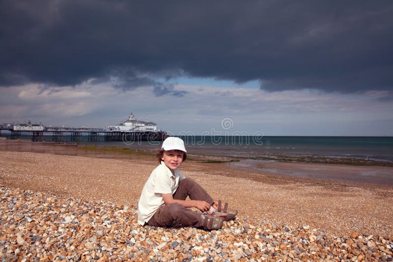 Boy at the beach stock photo. Image of happy, cloud, child - 10846224