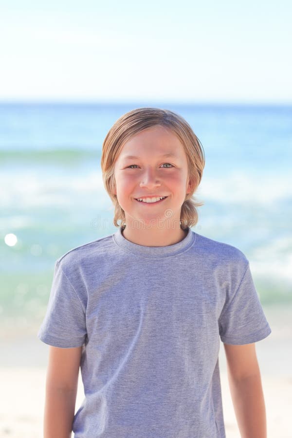 Boy at the beach stock image. Image of blue, male, mediterranean - 18701719