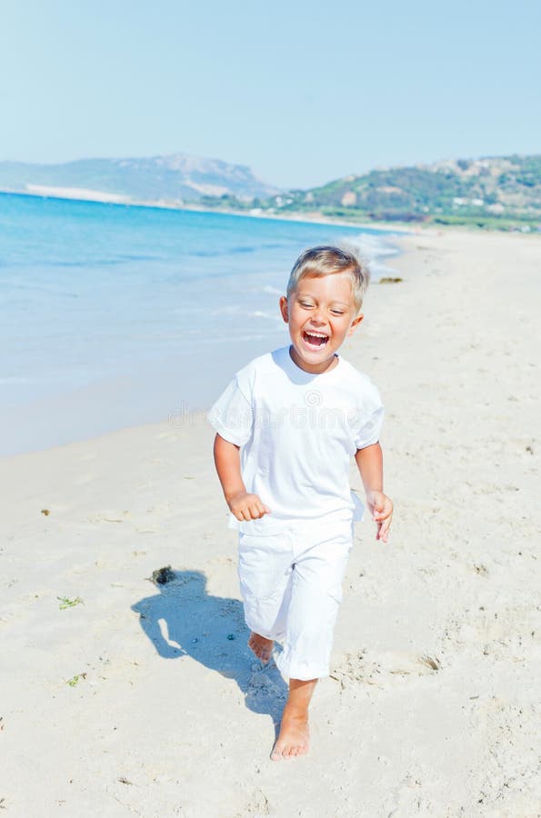 Boy on the beach stock photo. Image of beautiful, summer - 38308686