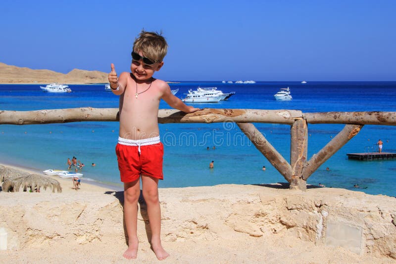 Boy on the beach stock image. Image of cute, travel, relaxed - 73707513
