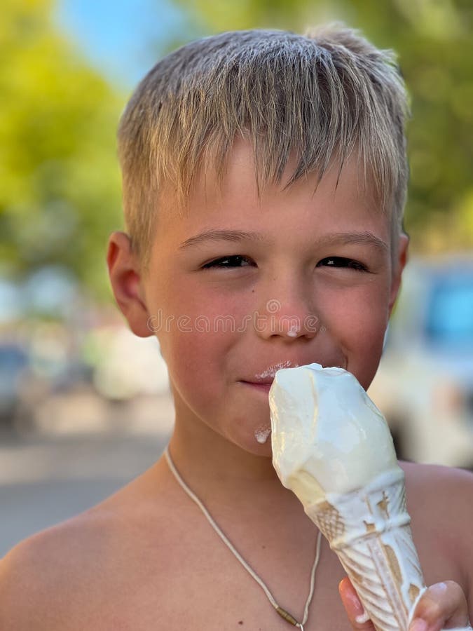 Boy on the Beach Eating Ice Cream in a Waffle Cone Stock Image - Image ...