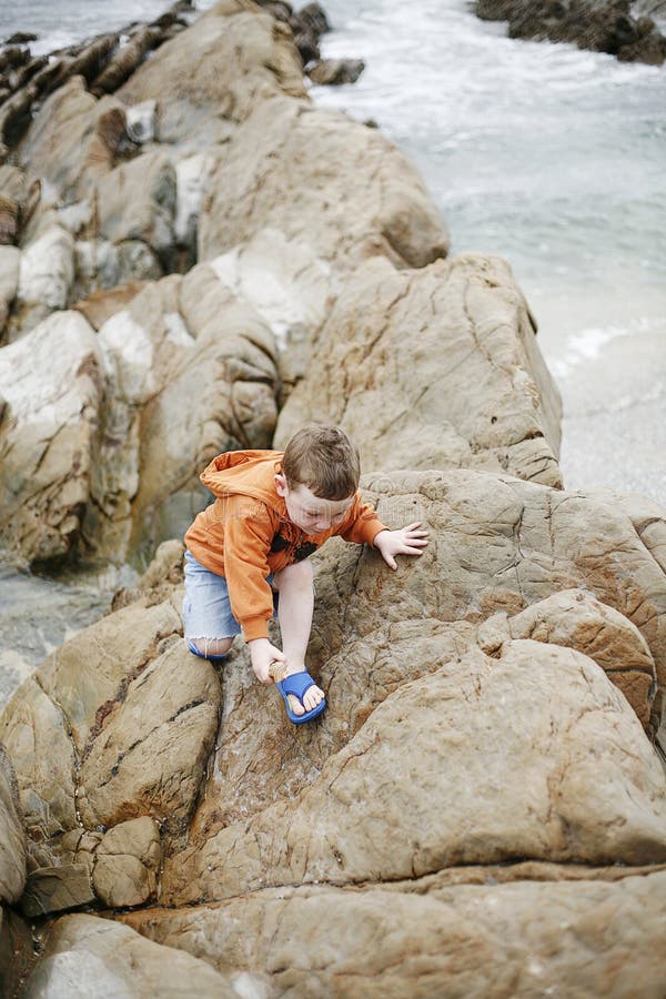 Boy at the Beach stock photo. Image of exploring, adventure - 35310318