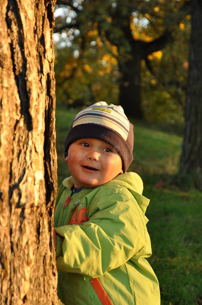 273 Boy Hiding Behind Tree Stock Photos - Free & Royalty-Free Stock ...