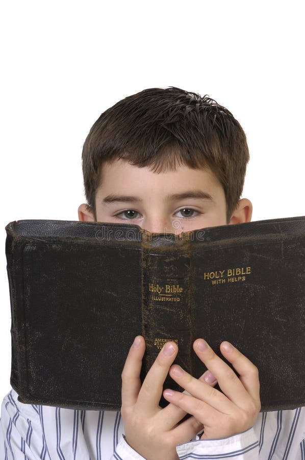 Child Praying while Hugging Bible Stock Image - Image of white, praying ...