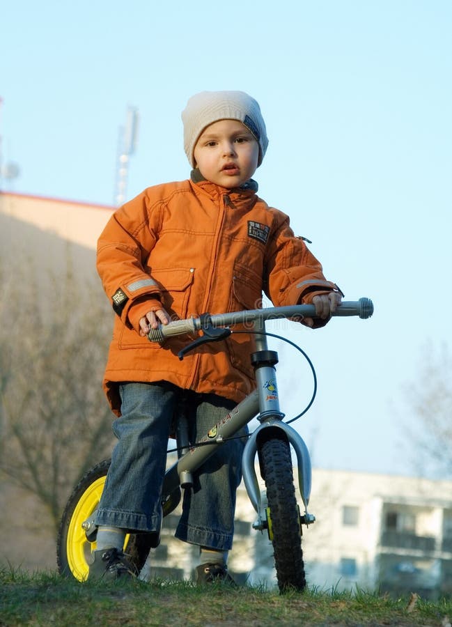 The boy and a bicycle stock photo. Image of hobbies, park - 2294122