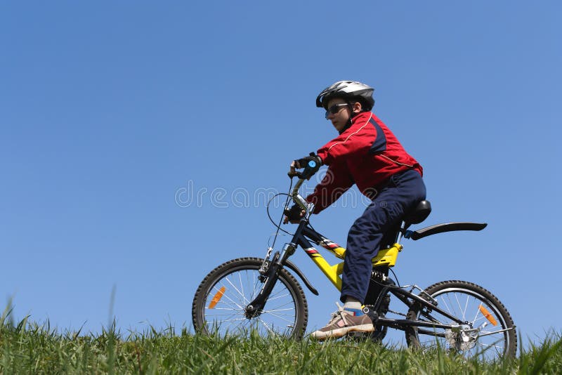 Boy on bicycle stock photo. Image of sneakers, blue, spectacles - 9311758