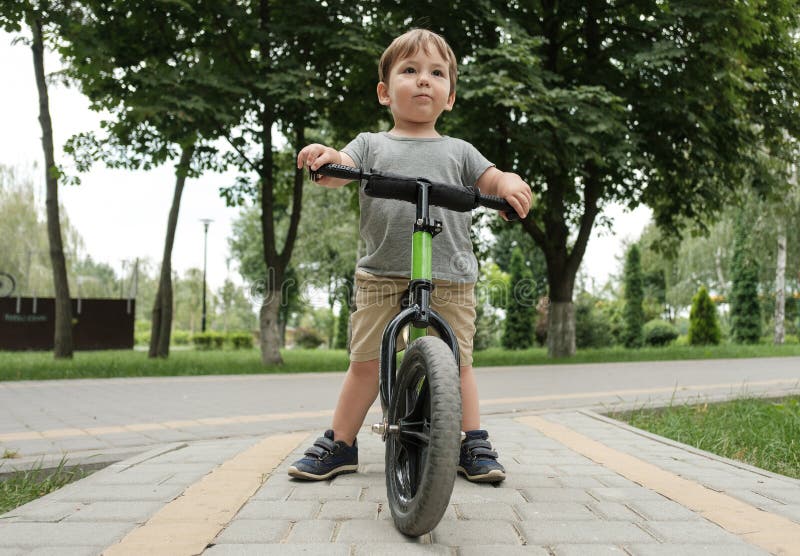 Boy on a bicycle stock photo. Image of outdoor, balance - 121246850