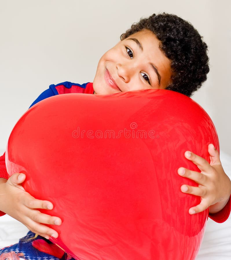 Boy and big heart stock image. Image of hand, happy, mood - 27444499