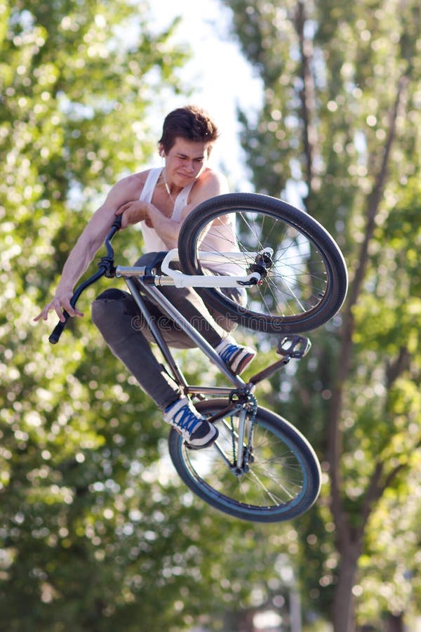 Boy on Bike Make the Tabletop Trick Stock Photo - Image of bicycle ...