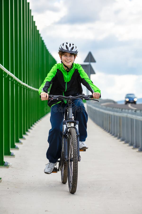 Boy biking stock image. Image of bicyclist, bicycle, adolescent - 60516229